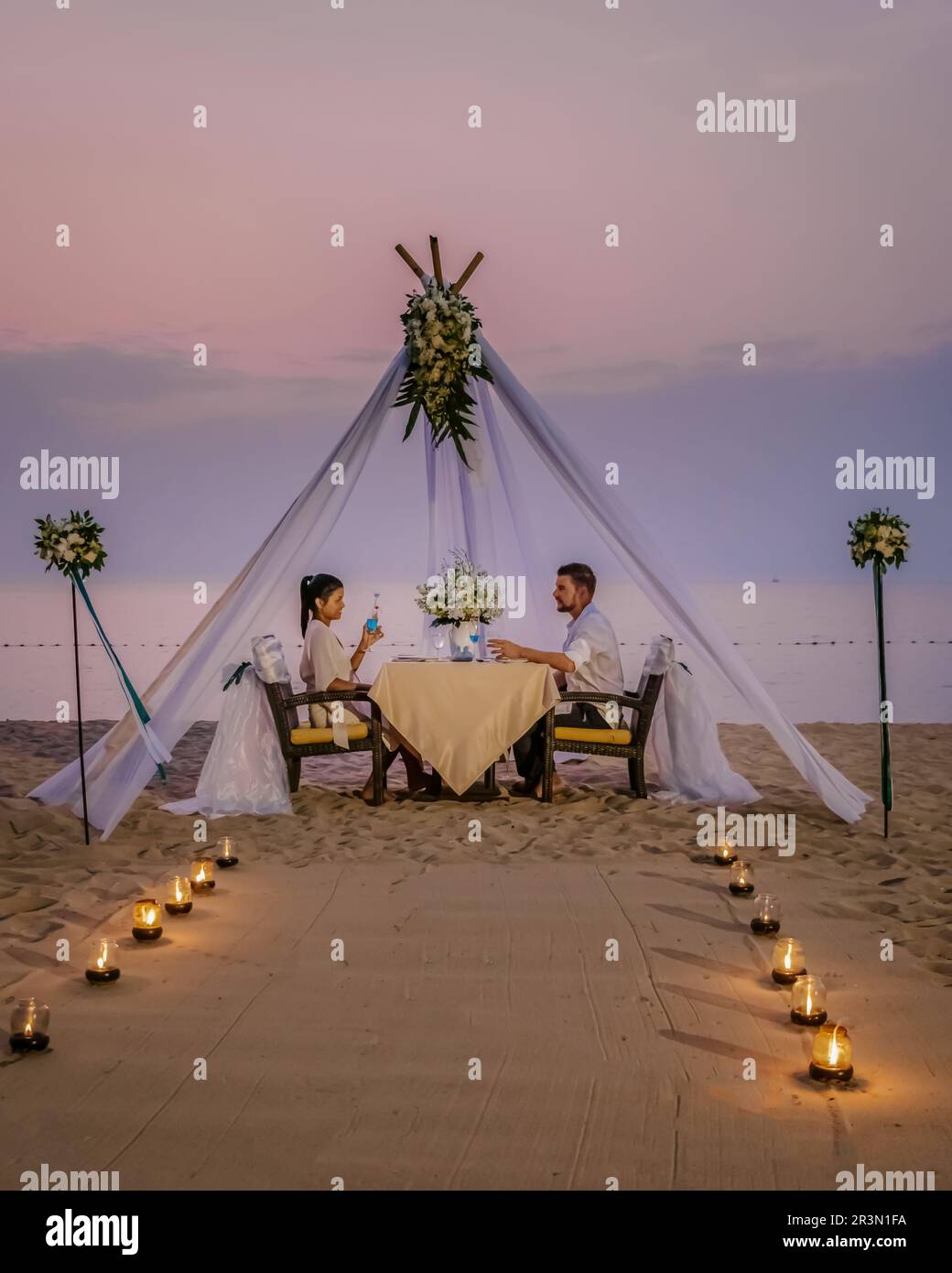 Romantic dinner on the beach, honeymoon dinner on the beach during ...