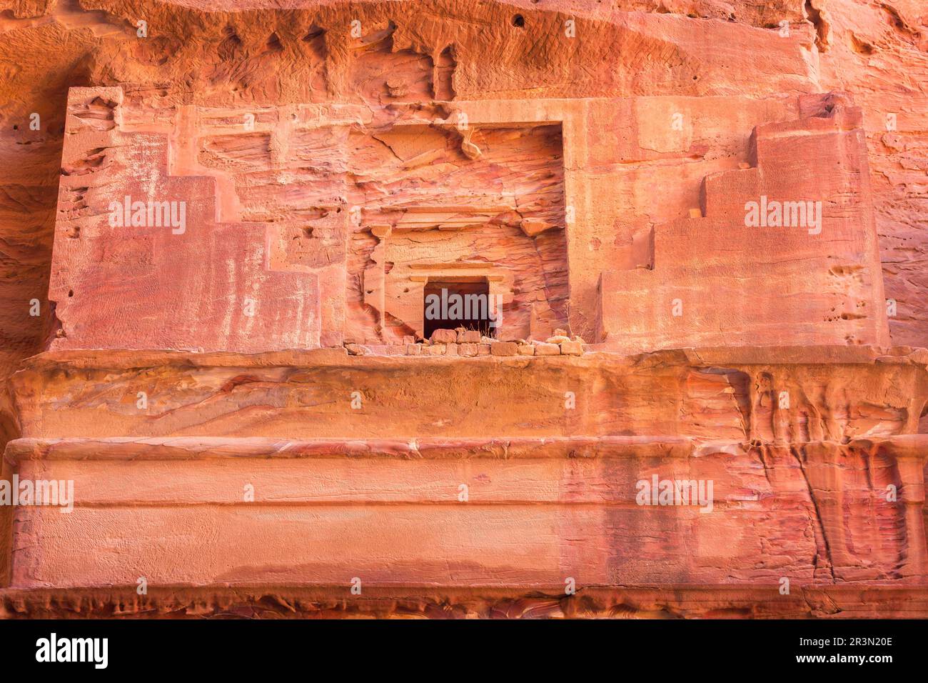 Carved caves in the ancient Petra City, Jordan Stock Photo - Alamy