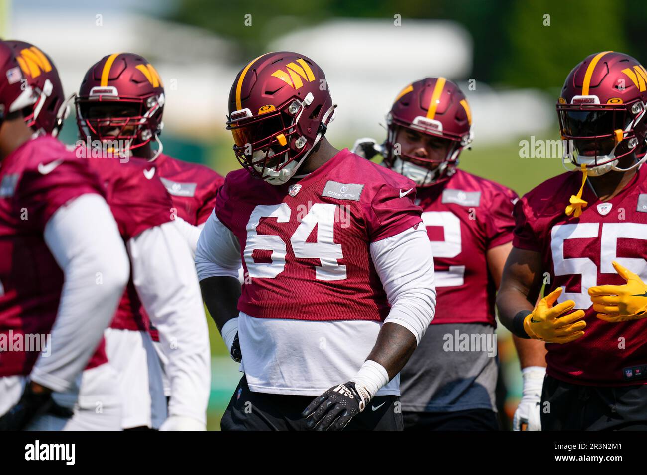 Washington Commanders defensive tackle David Bada (64), defensive end K ...