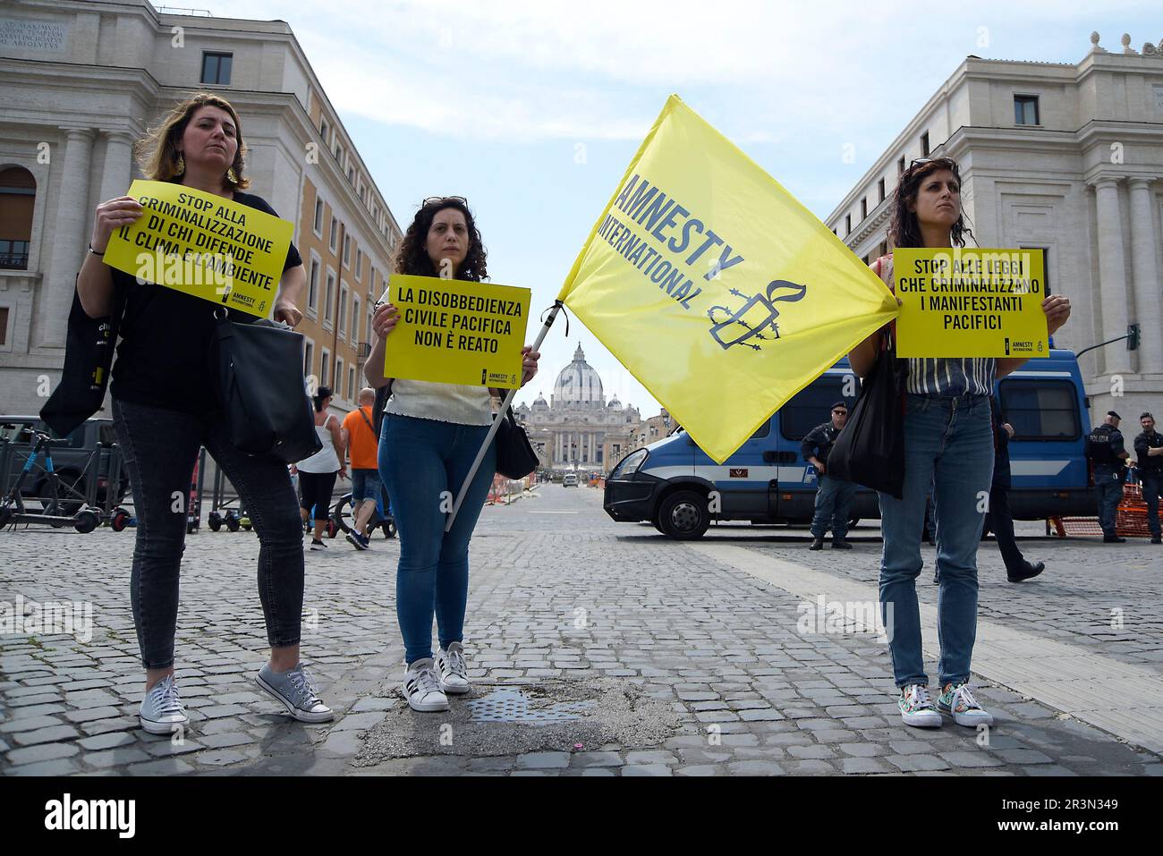 Vatican City, Rome, ITALY. 24th May, 2023. Activists hold placards ...