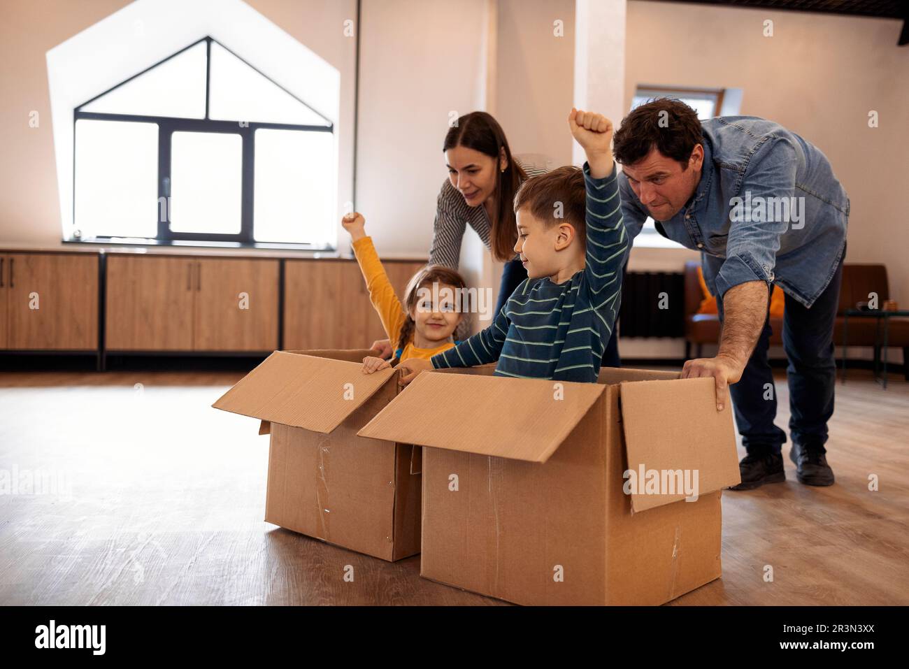 Family is celebrating moving day Stock Photo - Alamy
