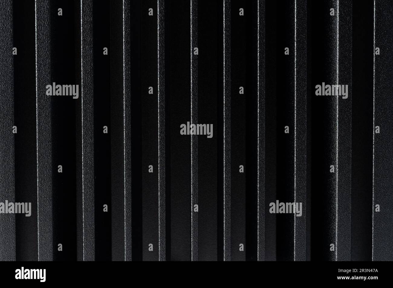 Black metal radiator pattern background close up view Stock Photo - Alamy
