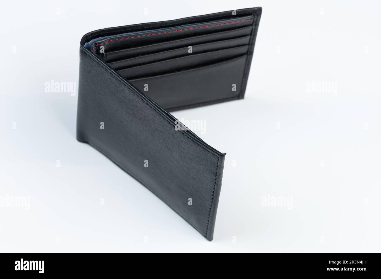 Black leather open wallet perspective view isolated on white studio ...