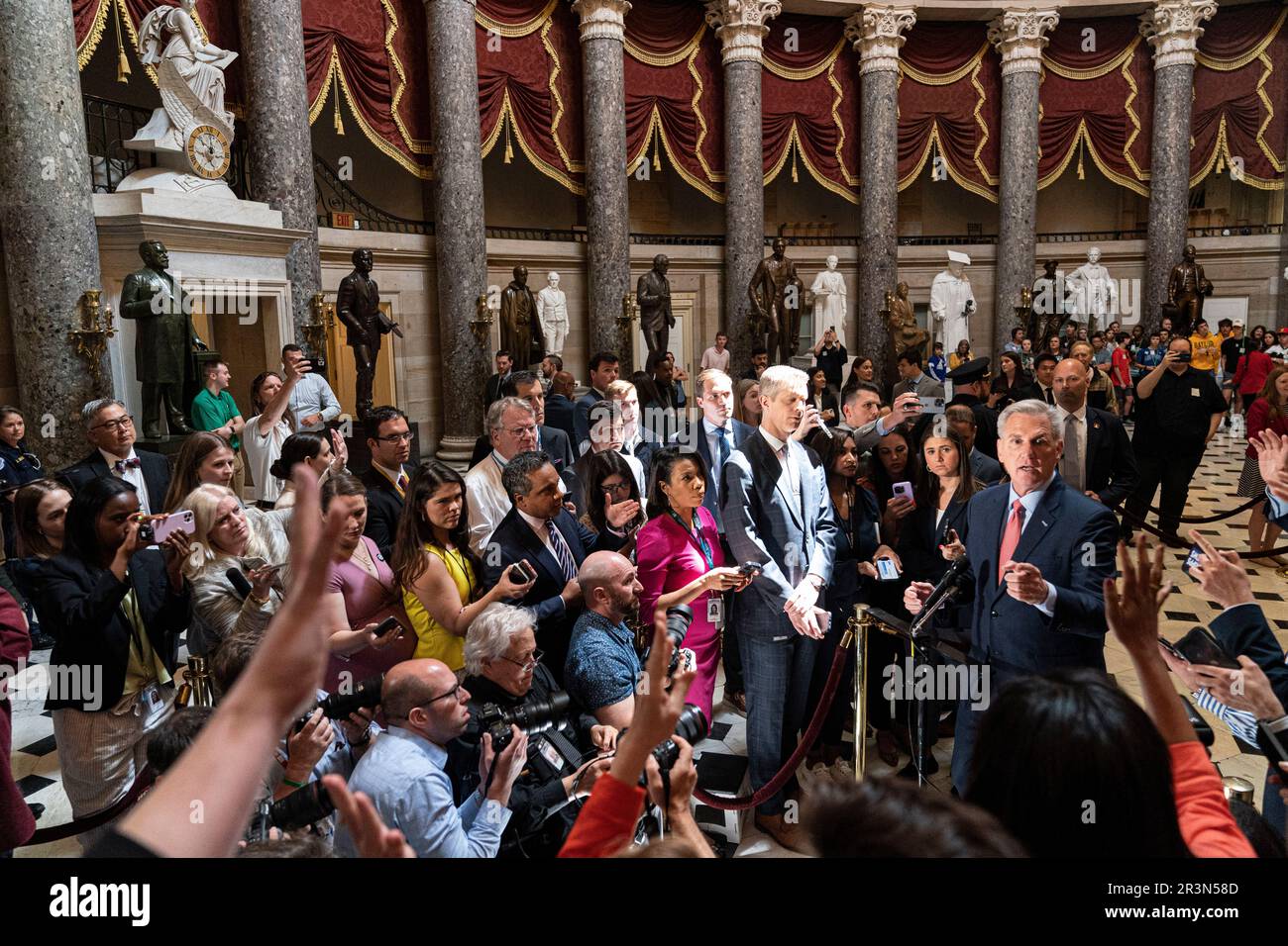 Reporters ask questions as House Speaker Kevin McCarthy of Calif., speaks about debt limit ...