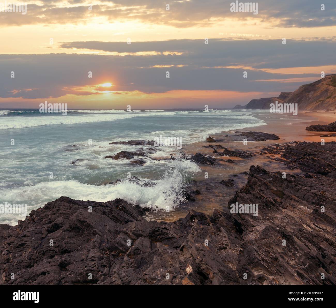 Storm on Castelejo beach with black schist cliffs (Algarve, Portugal ...
