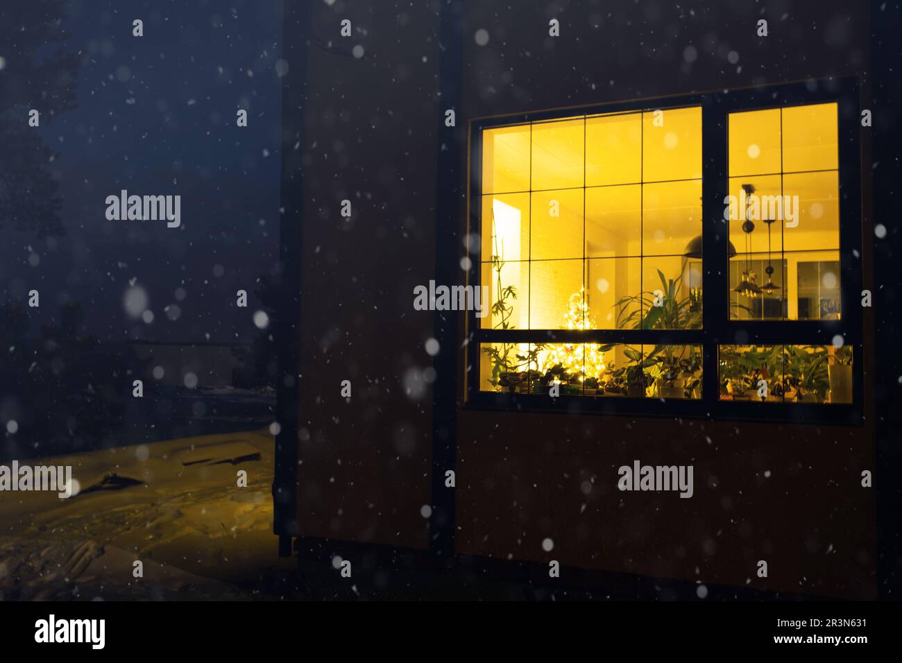 Cozy festive window of the house outside with the warm light of fairy ...