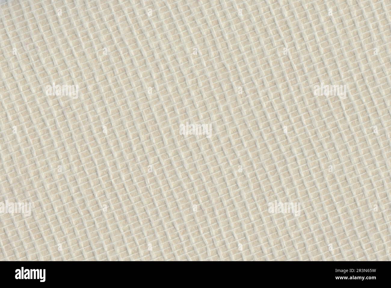 Woven glass fiber wallpaper against a light yellow background. Meant as ...