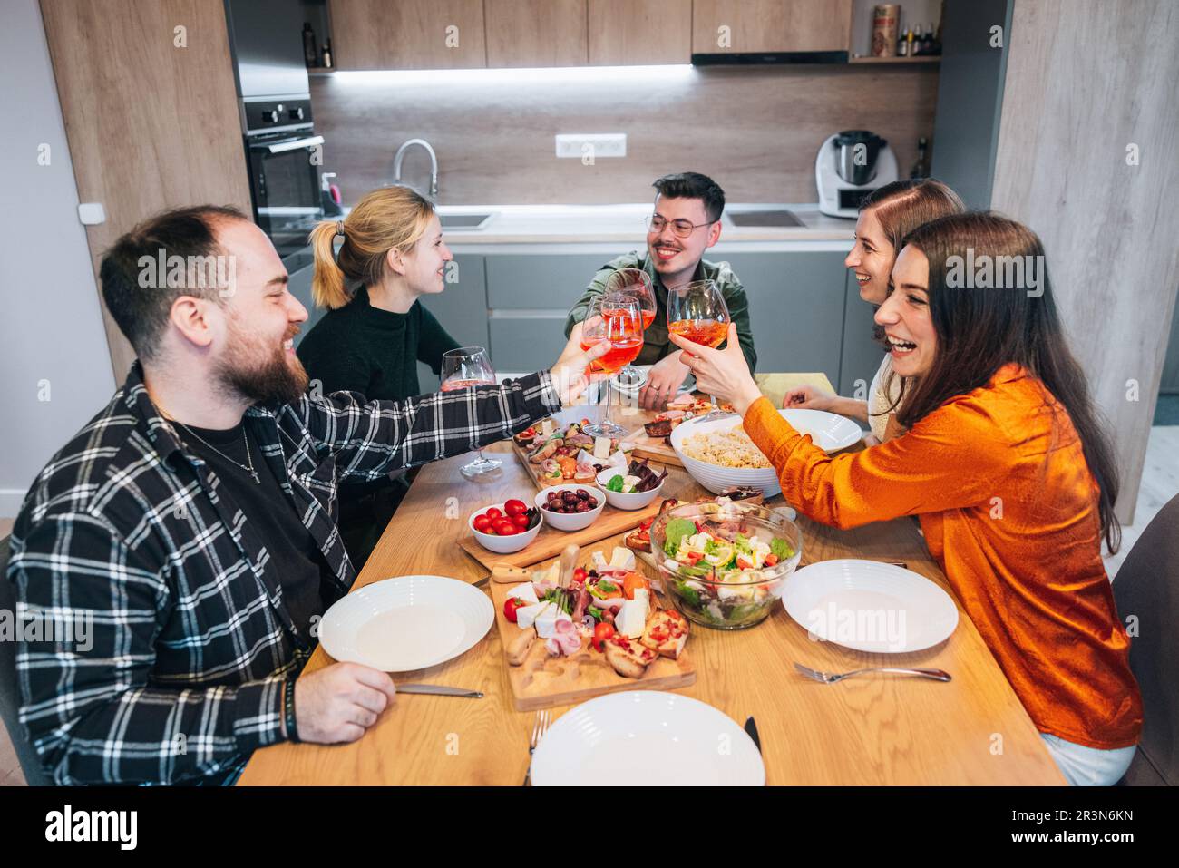 A group of friends on a lovely day gathered together to enjoy time ...
