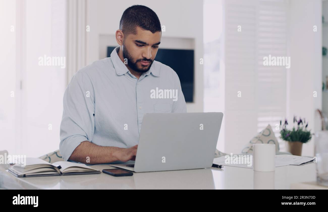 Man, remote work and typing at laptop in home for digital planning ...