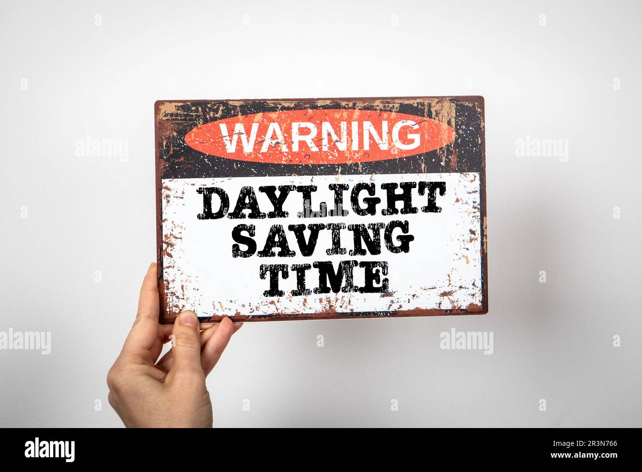 Daylight Saving Time. Warning sign with text on a white background ...