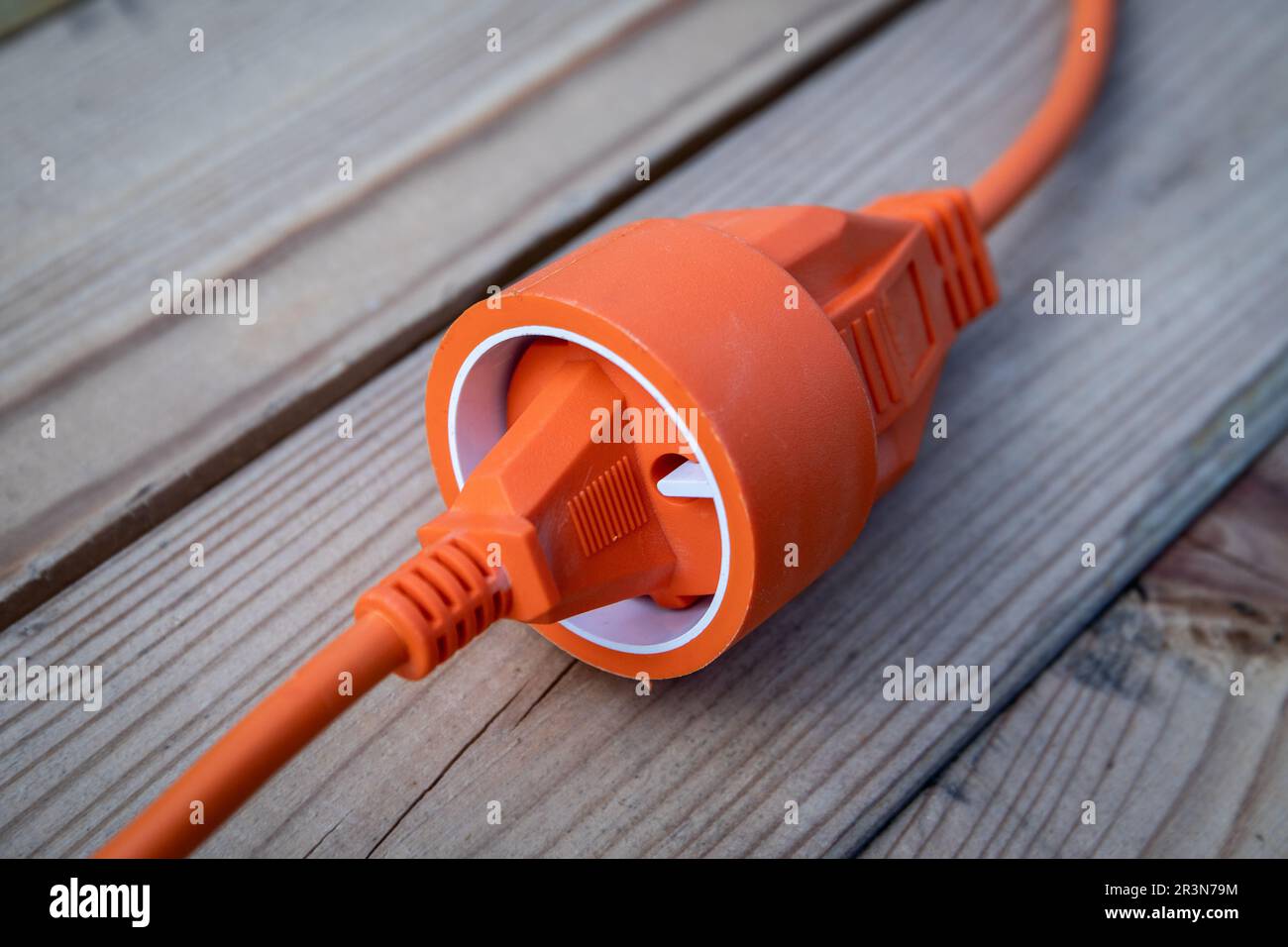 Electric wire, cable or extension cord on wood texture background Stock ...