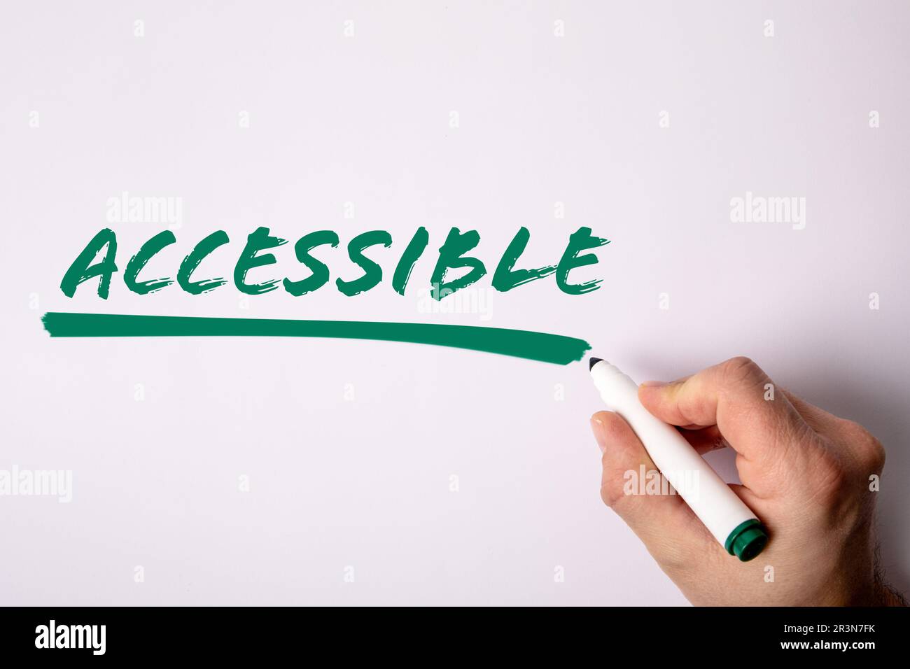 Accessible. Handwriting text with green marker on a white background ...