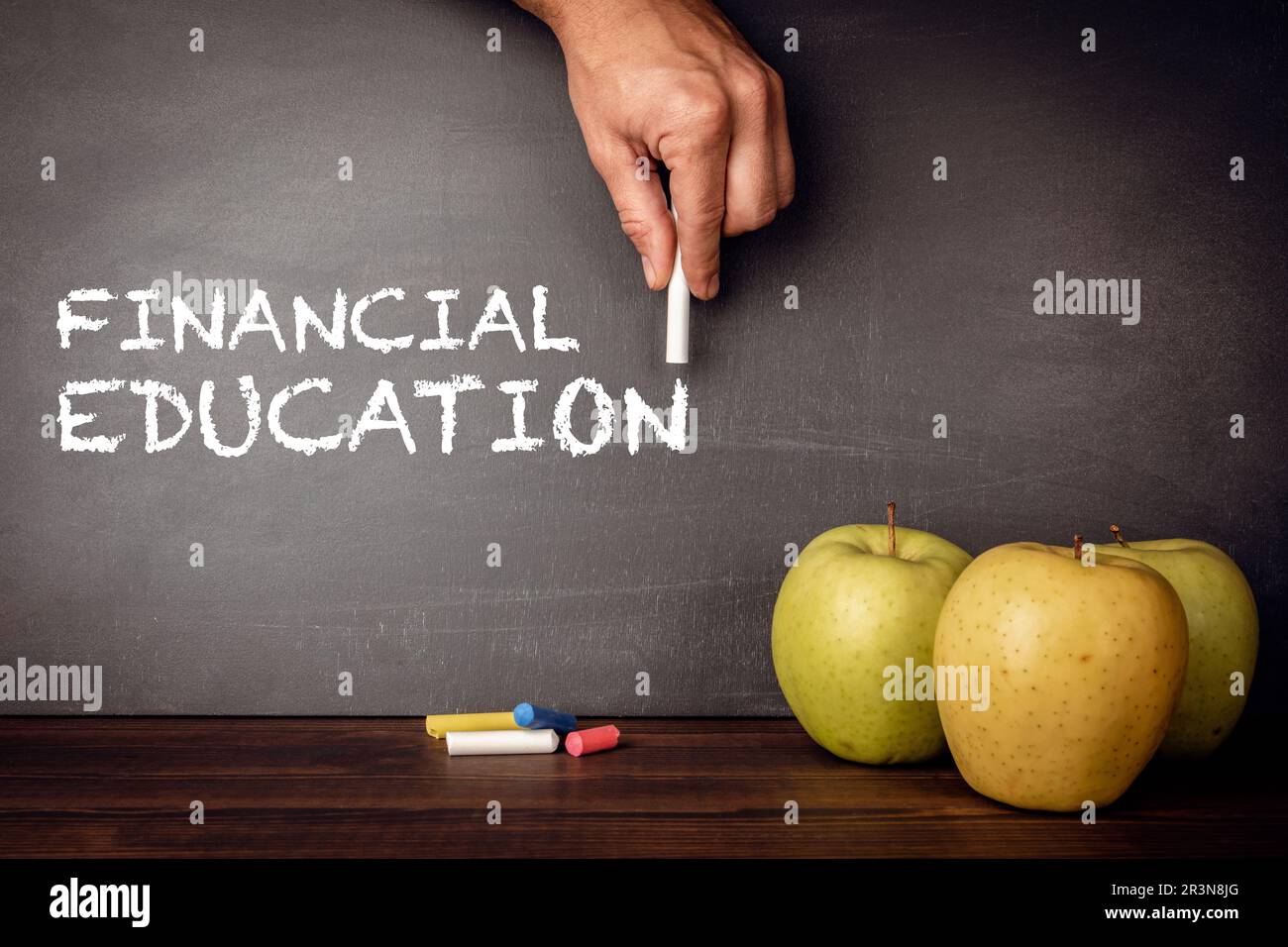 Financial Education Concept. Text and green apples on a chalkboard ...