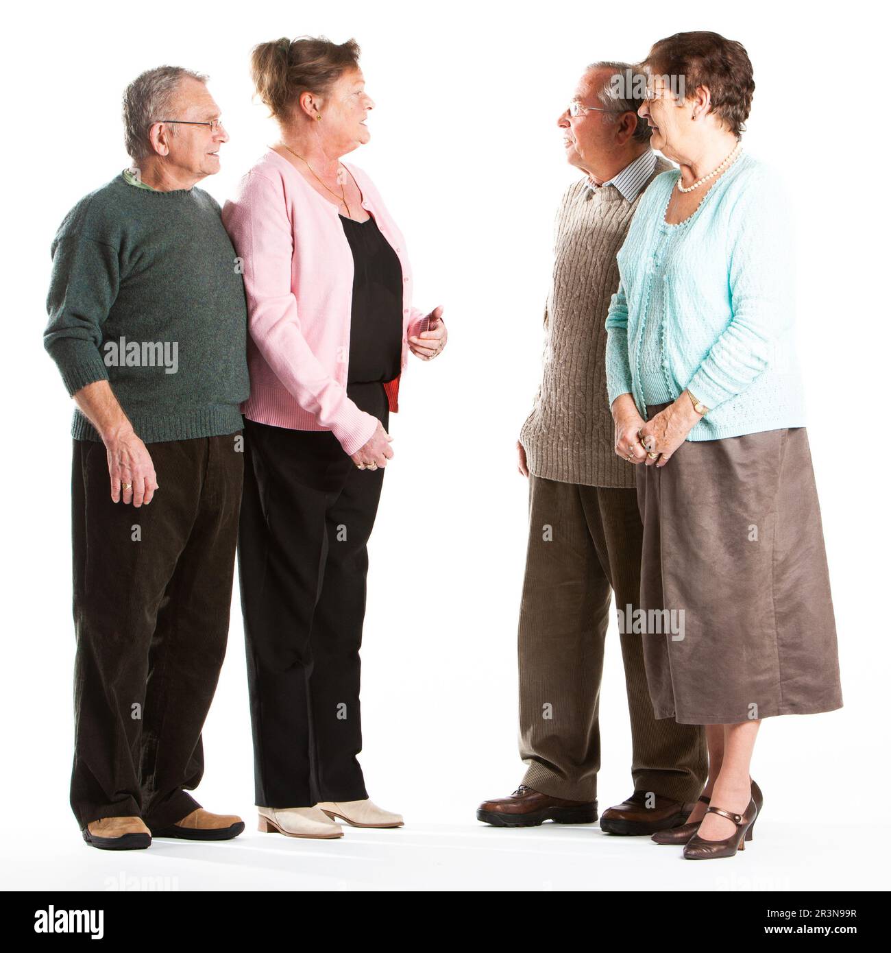 Senior Citizens: Friends talking. 2 senior couples having an informal ...