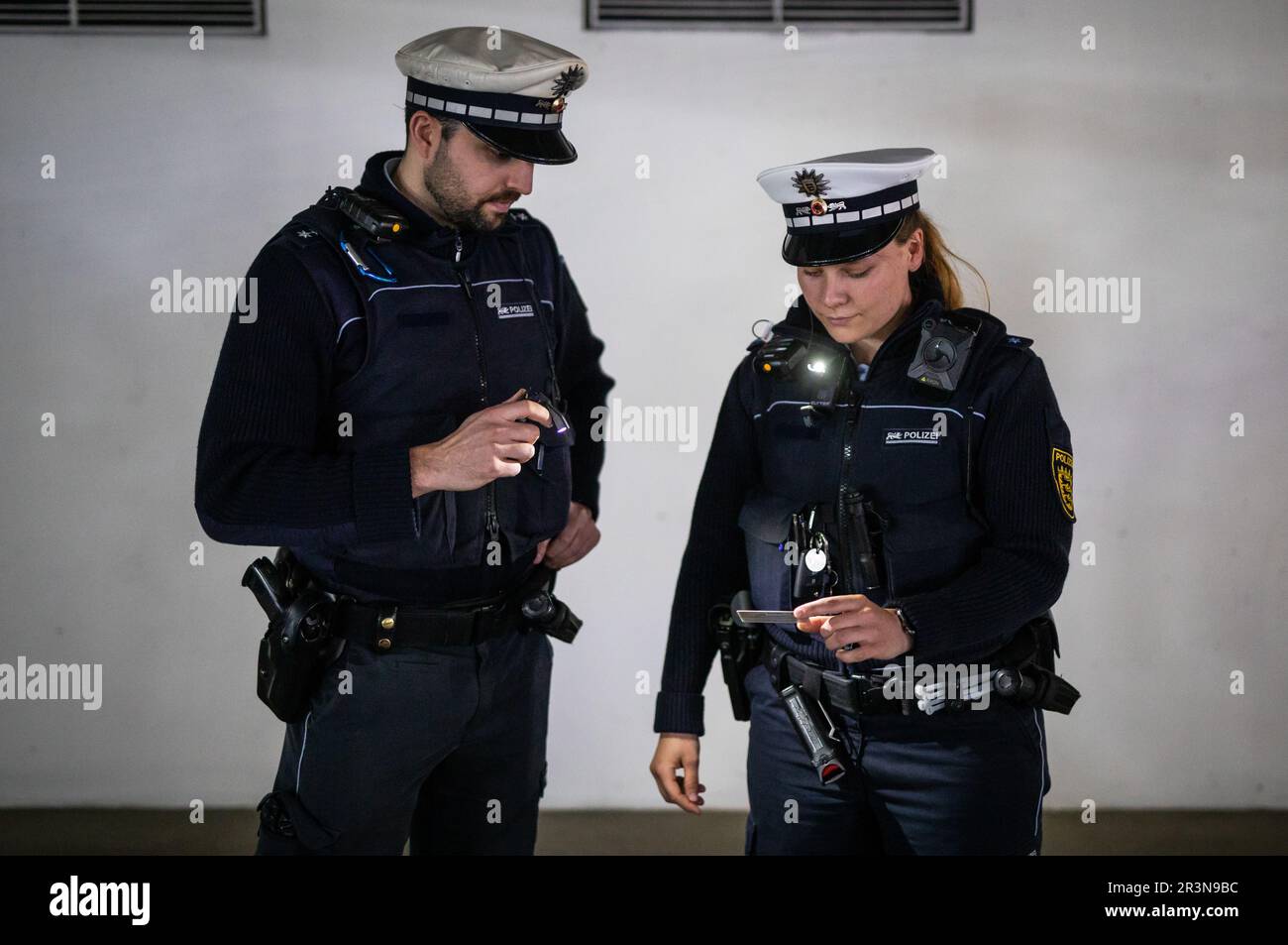 Stuttgart, Germany. 24th May, 2023. Two police officers use their new ...