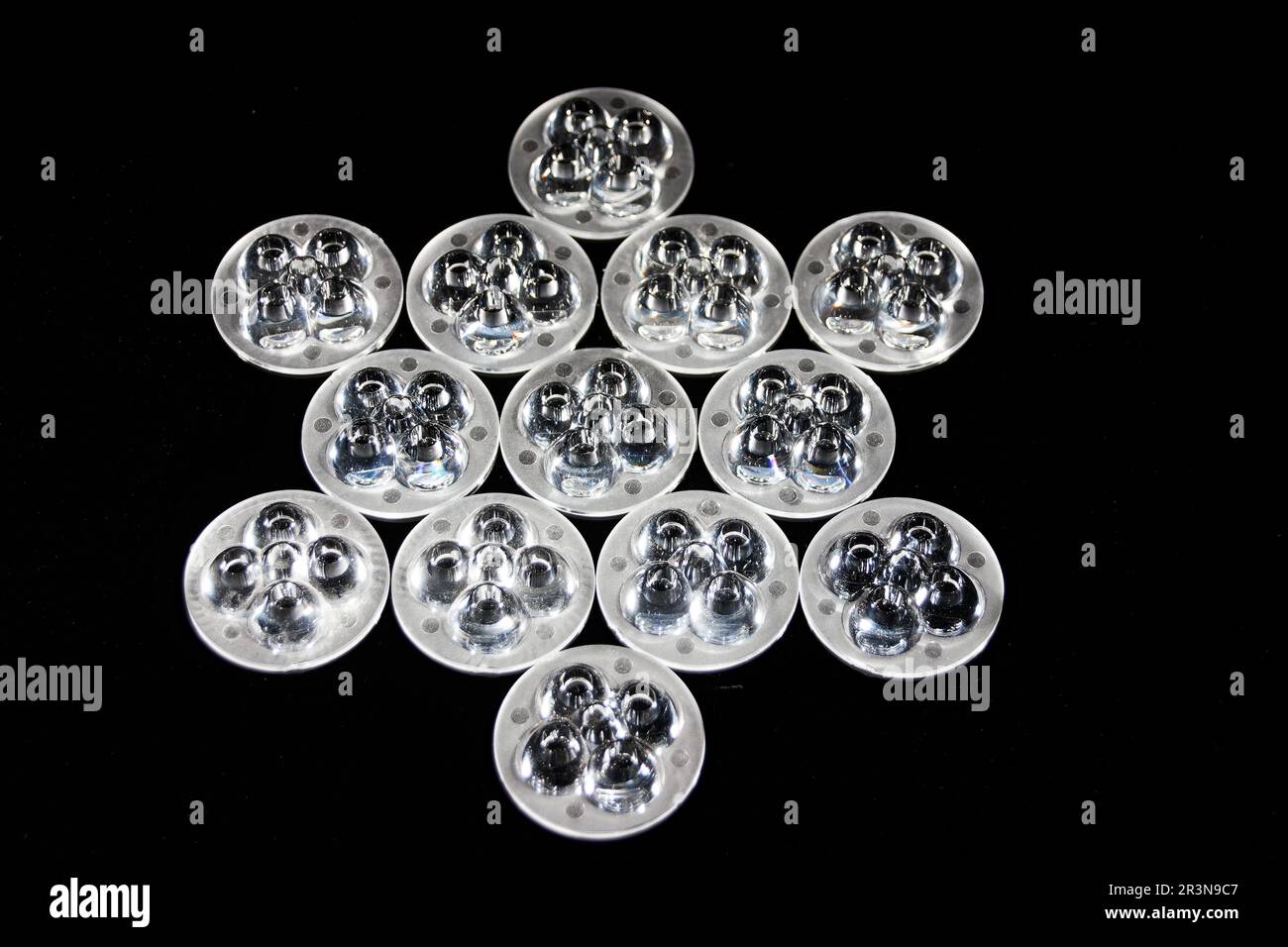 structured black and white real glass objects isolated on black ...
