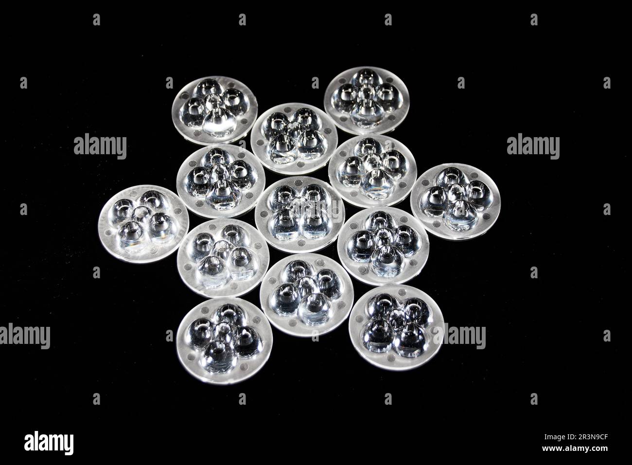 structured black and white real glass objects isolated on black ...