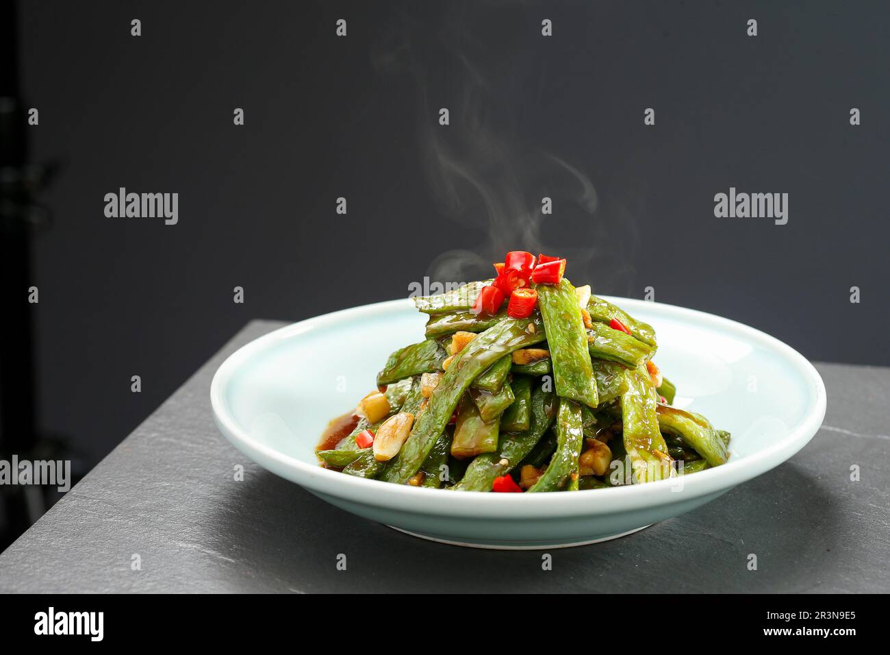 Stir-Fried snow peas ,chinese food Stock Photo - Alamy