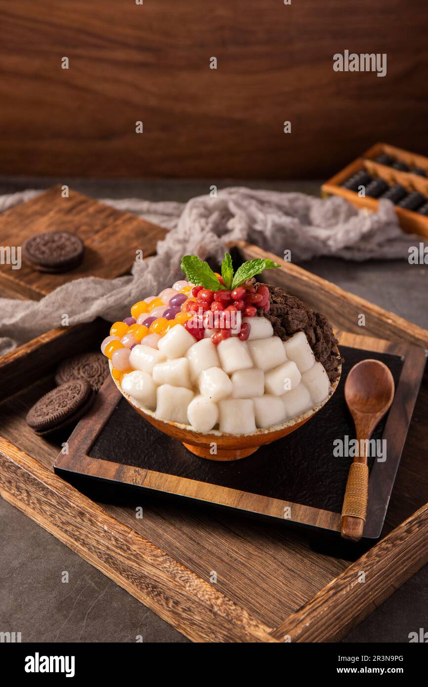Bingsu dessert, iced dessert fruit with Taro ball Stock Photo - Alamy