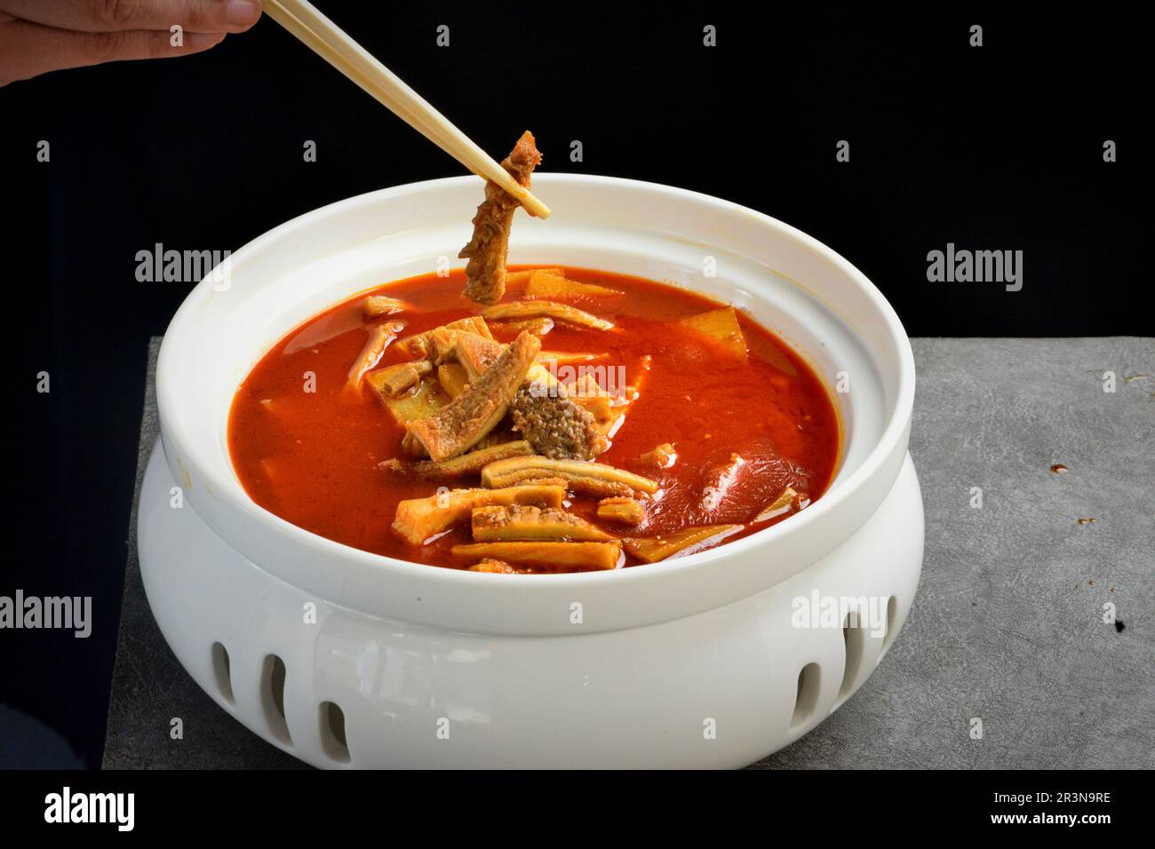 Braised beef tripe in Clay pot Stock Photo - Alamy