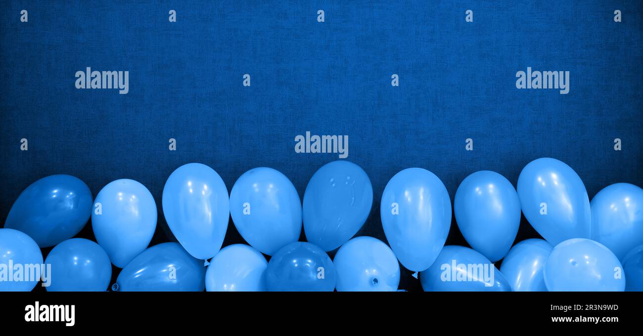 Blue balloons panoramic Stock Photo - Alamy