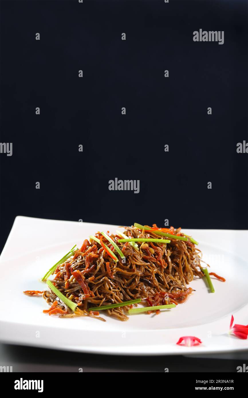 Stir- fried smoked bamboo shoots Stock Photo - Alamy