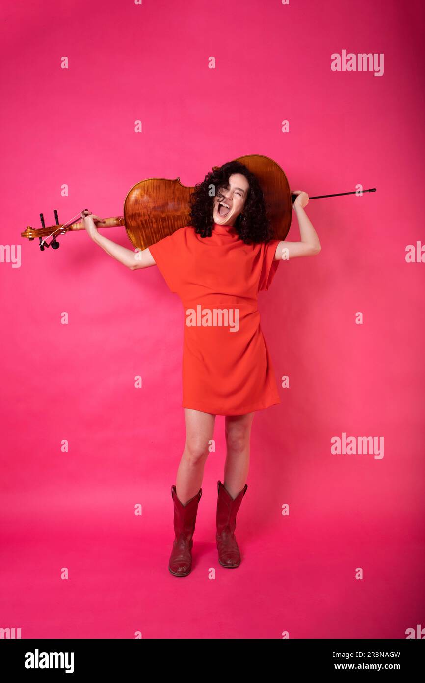 Full length woman cello hi-res stock photography and images - Alamy