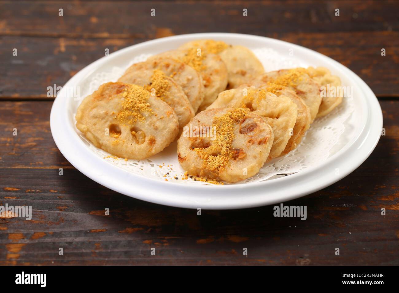 Pan-Fried lotus root mince prok meat patties Stock Photo - Alamy