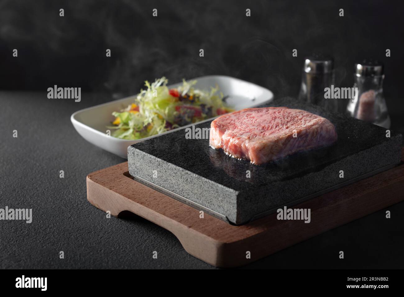 Japanese Miyazaki A5 Wagyu on a hot stone，sirloin steak on a very hot ...