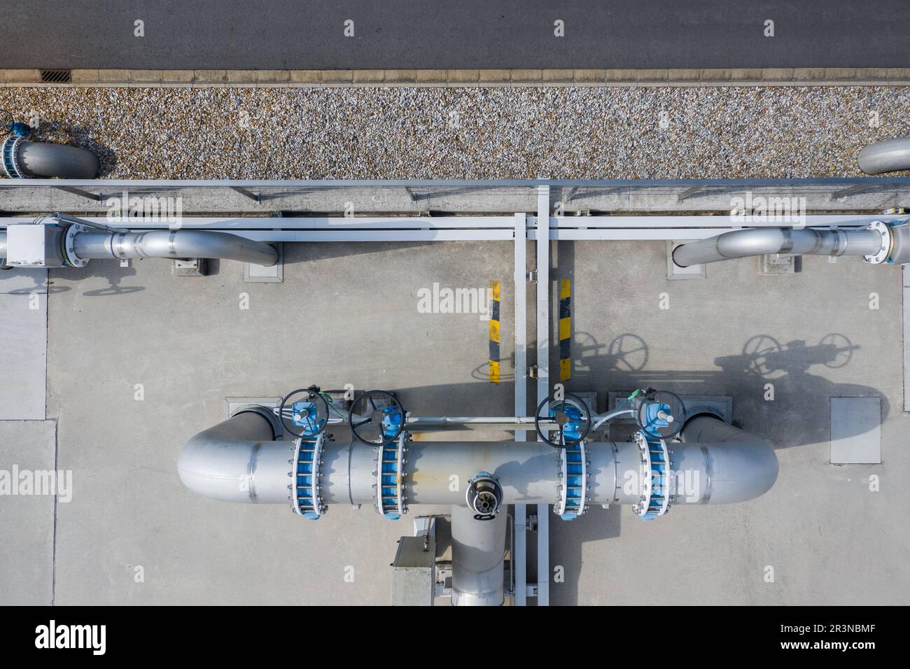 From above of construction of metal gasoline pipes and tubes with ...