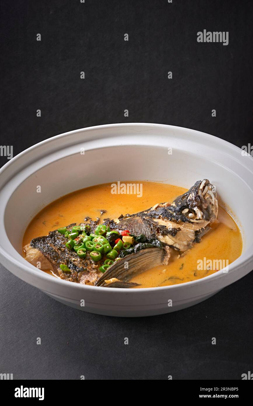 Fish fillet in sour soup hi-res stock photography and images - Alamy