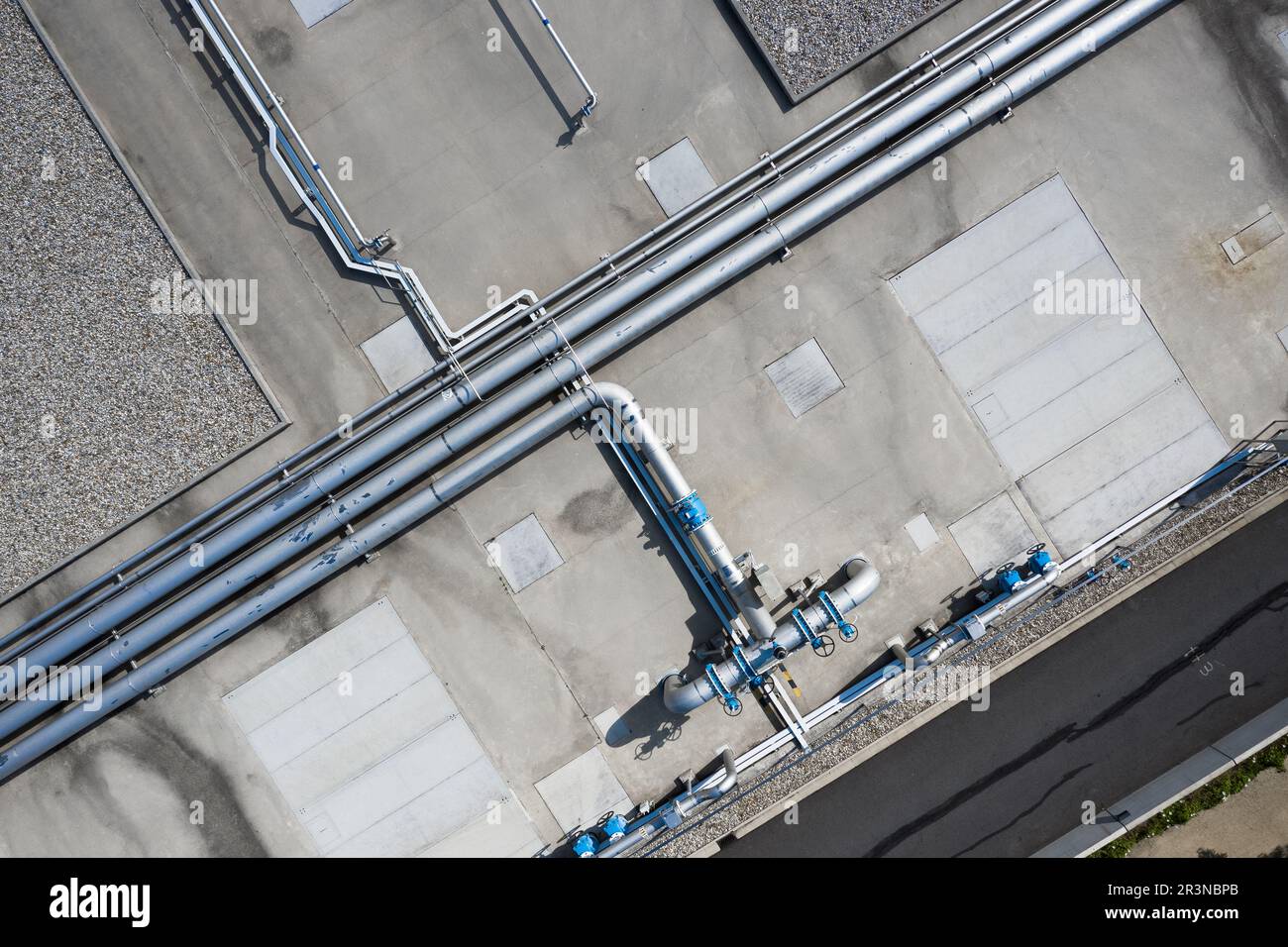 Top view of steel water piping structure with circulation pumps and ...