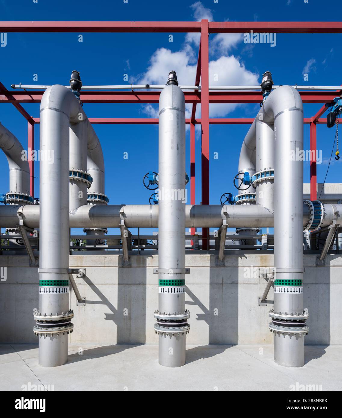 Modern exterior of construction of gray metal water pipes and tubes ...