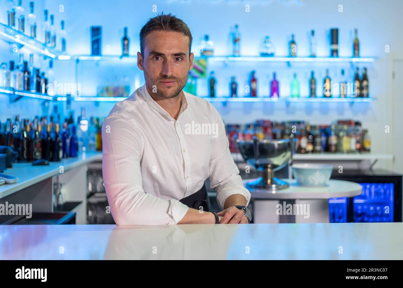 Male barkeeper in uniform hi-res stock photography and images - Alamy