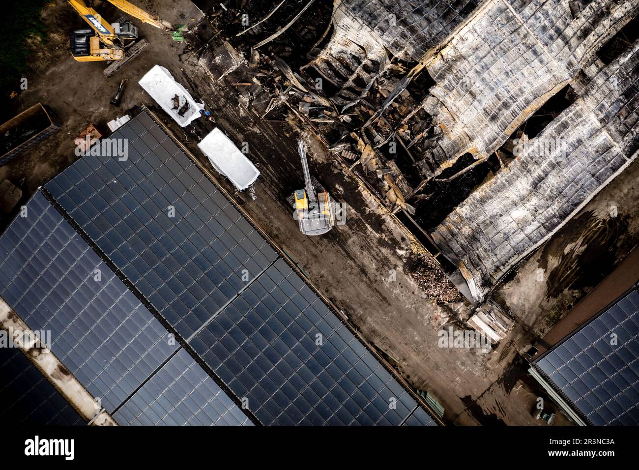 REUSEL - Solar panels on the roof of stables next to a burned down ...