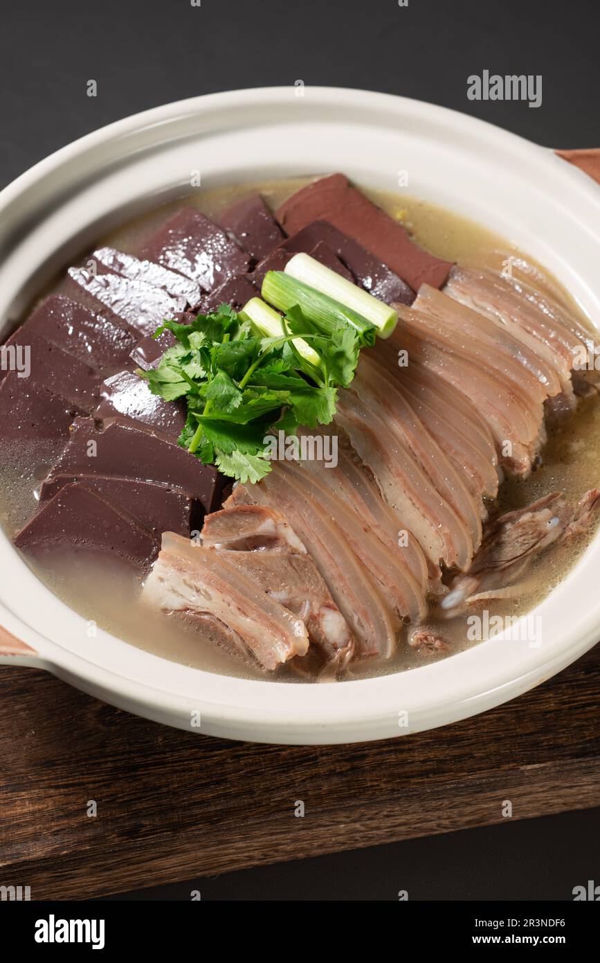 Double Boiled Lamb Soup with duck blood en Casserole Stock Photo - Alamy