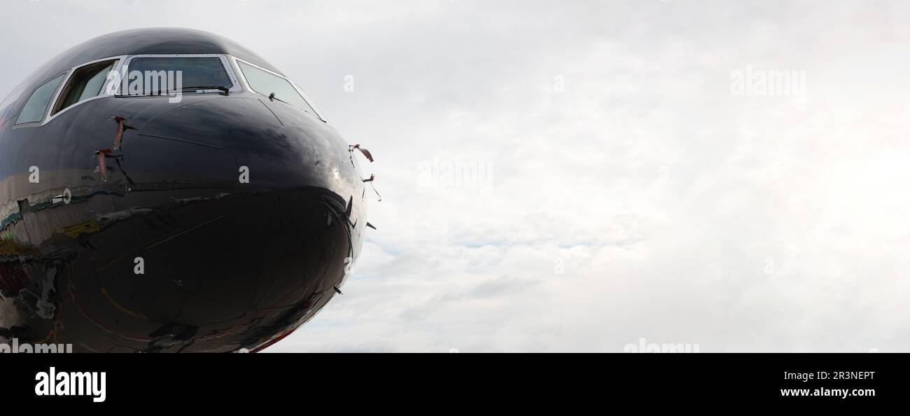 Front section of black business jet Stock Photo - Alamy