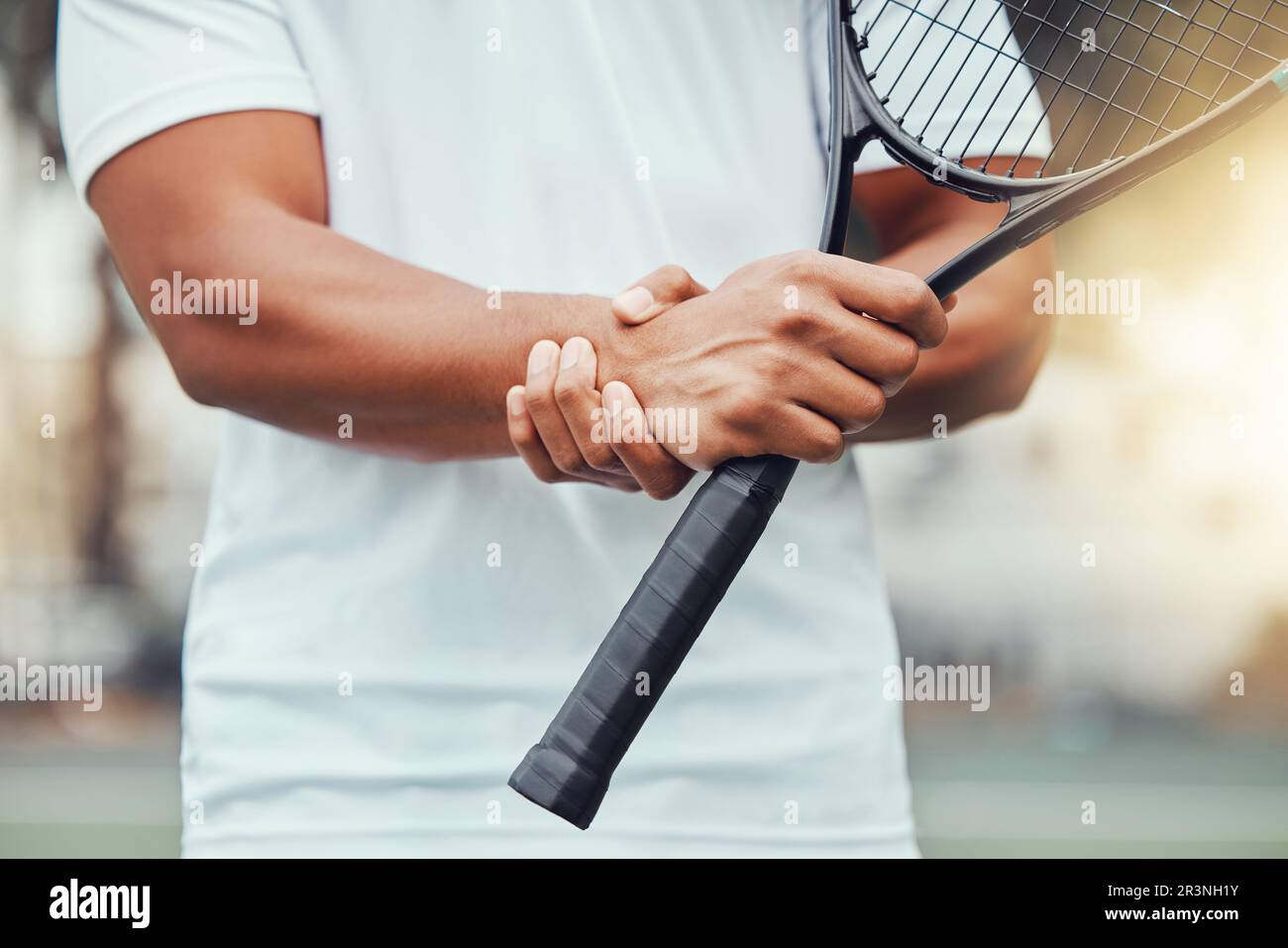 Tennis court, hand injury and man with racket for sports, fitness and ...