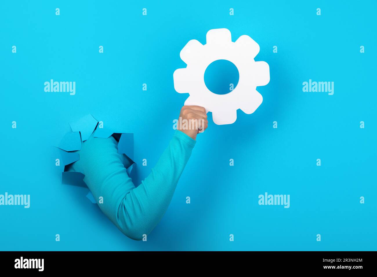 Business hand holding gear mechanism hi-res stock photography and ...