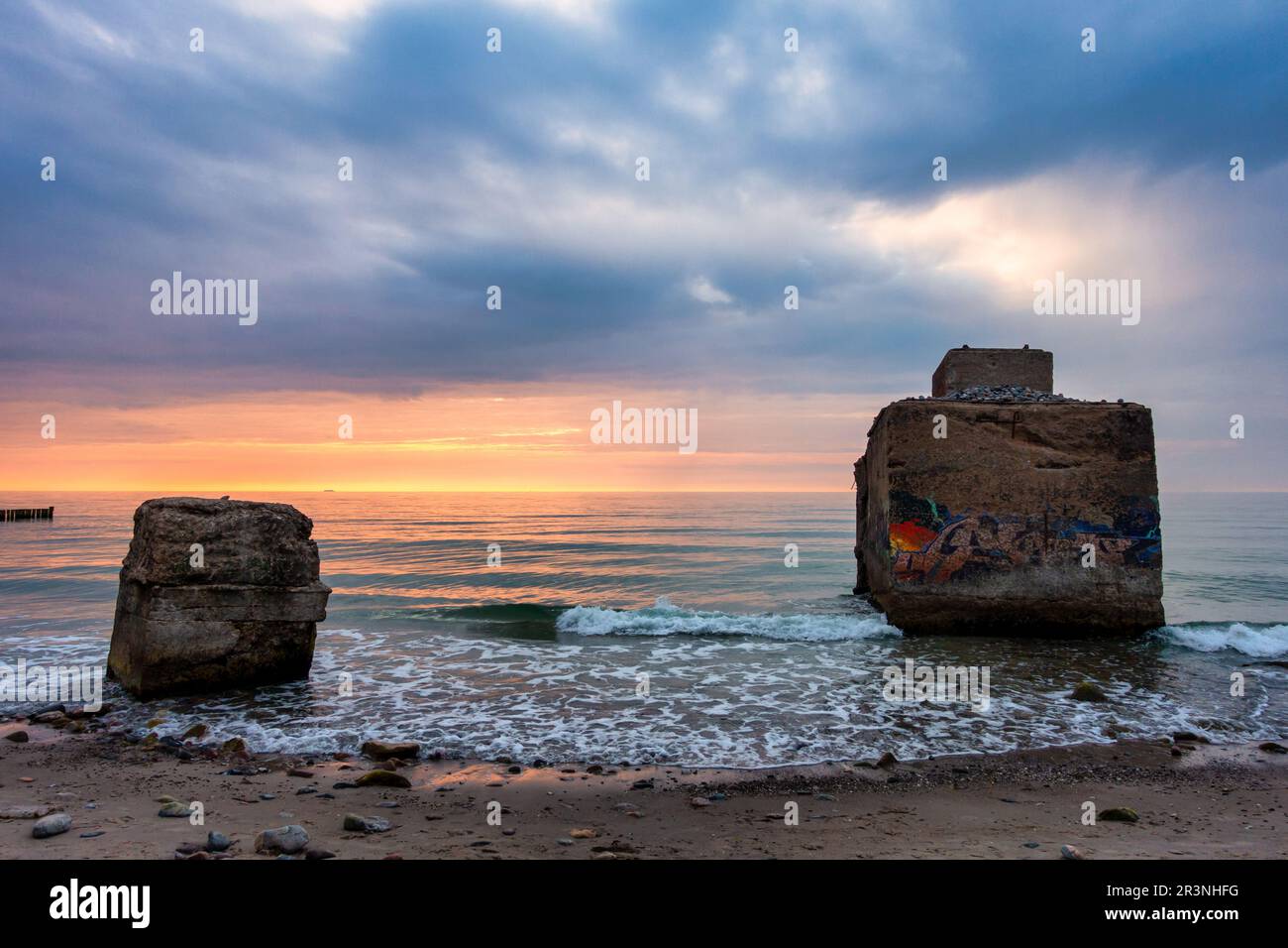 Atmospheric sunset on beach baltic sea Stock Photo - Alamy