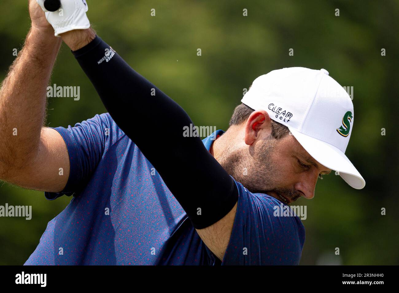 Charl Schwartzel of Stinger GC hits his shot on the driving range ...