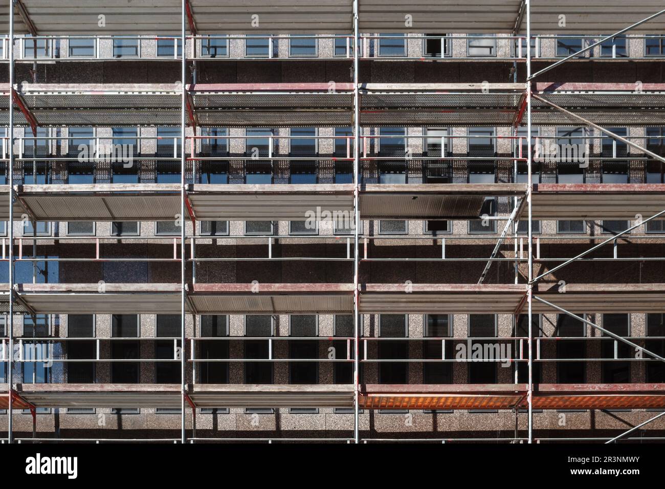 Front exterior view of scaffolding in front of building at construction ...