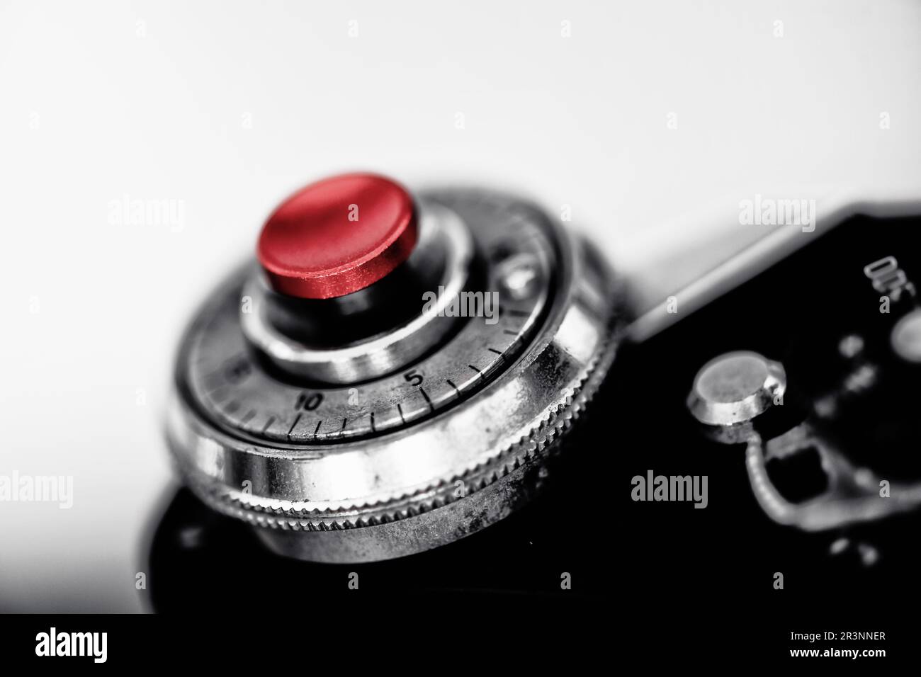 Red shutter button on an antique photo camera Stock Photo - Alamy