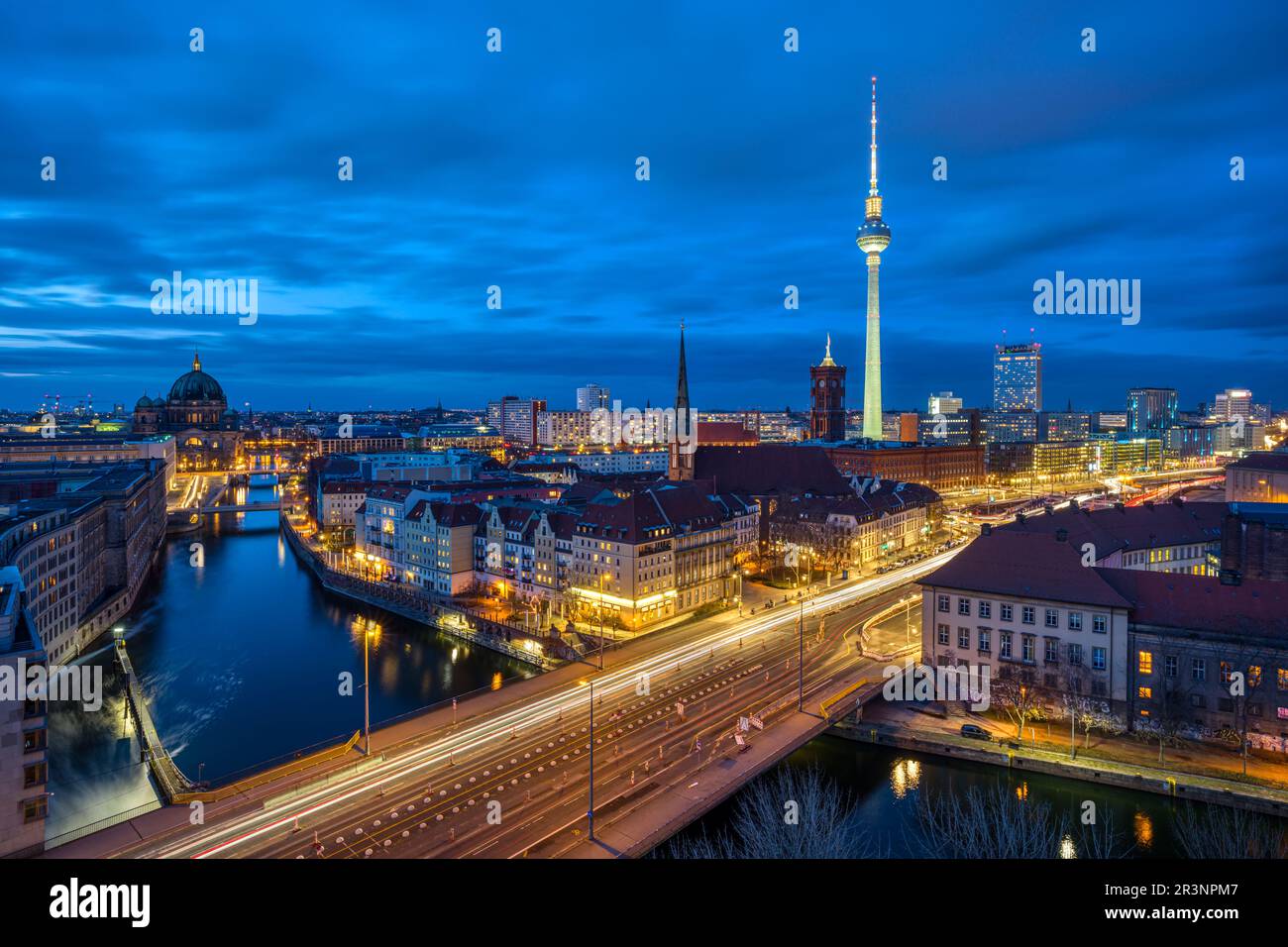 The center of Berlin with the famous TV Tower and a clouded sky at ...
