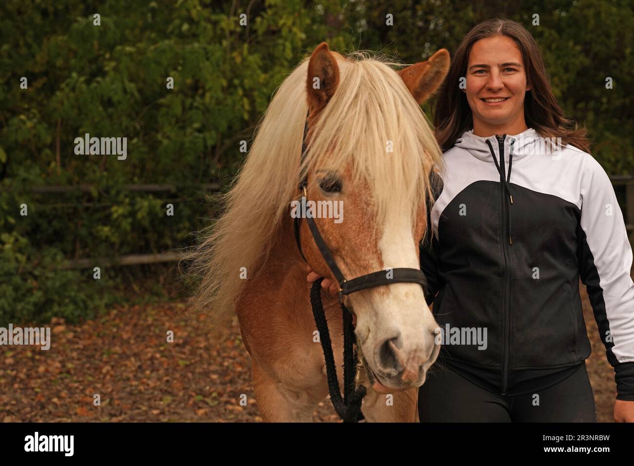 Best friends - light brown Haflinger with beige mane and her rider ...