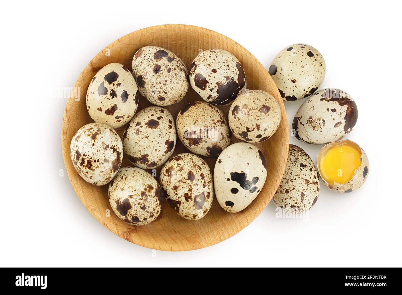 Raw quail egg in wooden bowl isolated on white background with full ...