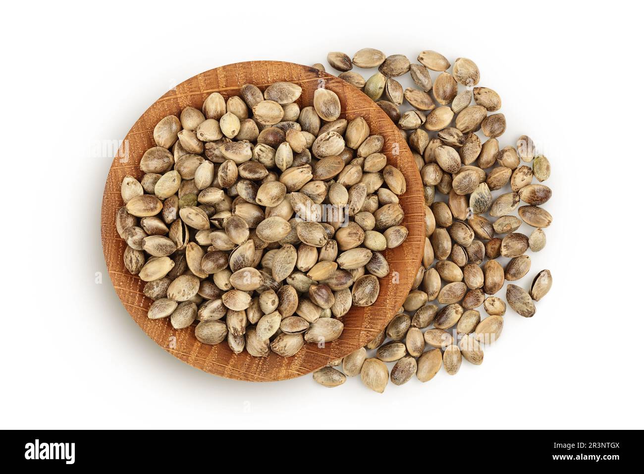 Hemp seeds in wooden bowl isolated on white background with full depth ...