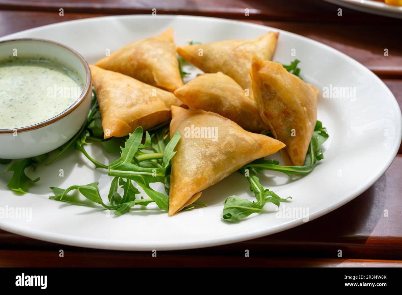 Traditional Middle East snack fried stuffed samosa pies with vegetables ...