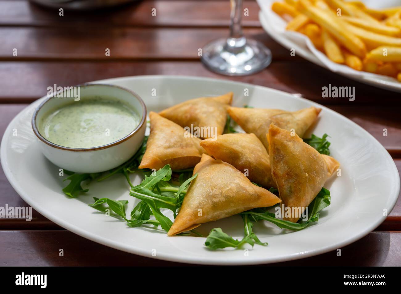 Traditional Middle East snack fried stuffed samosa pies with vegetables ...