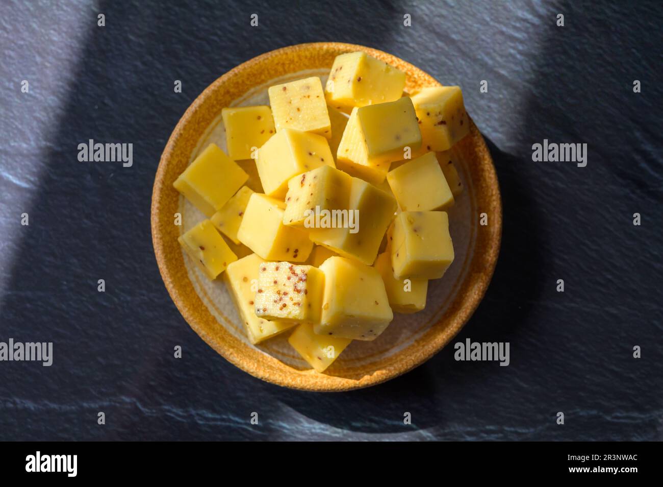 Cheese collection, matured yellow cow cheese with mustard seeds from ...